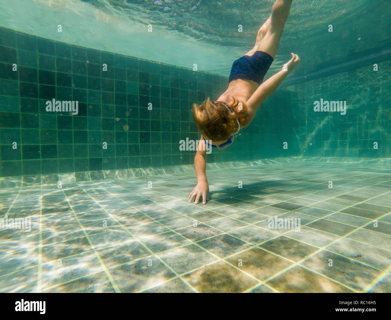 Boy Holding Breath Underwater High Resolution Stock Photography and ...