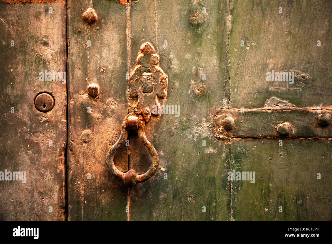 Old wooden door locked with rusty padlock, Funchal, Portugal Stock Photo - Alamy