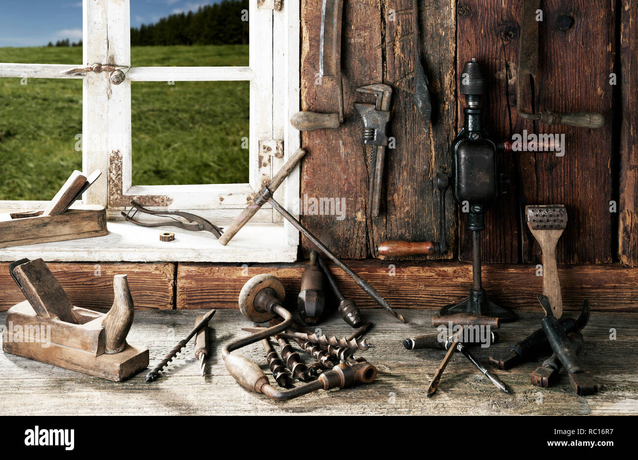 Vintage stylized old wood workshop interior Stock Photo - Alamy