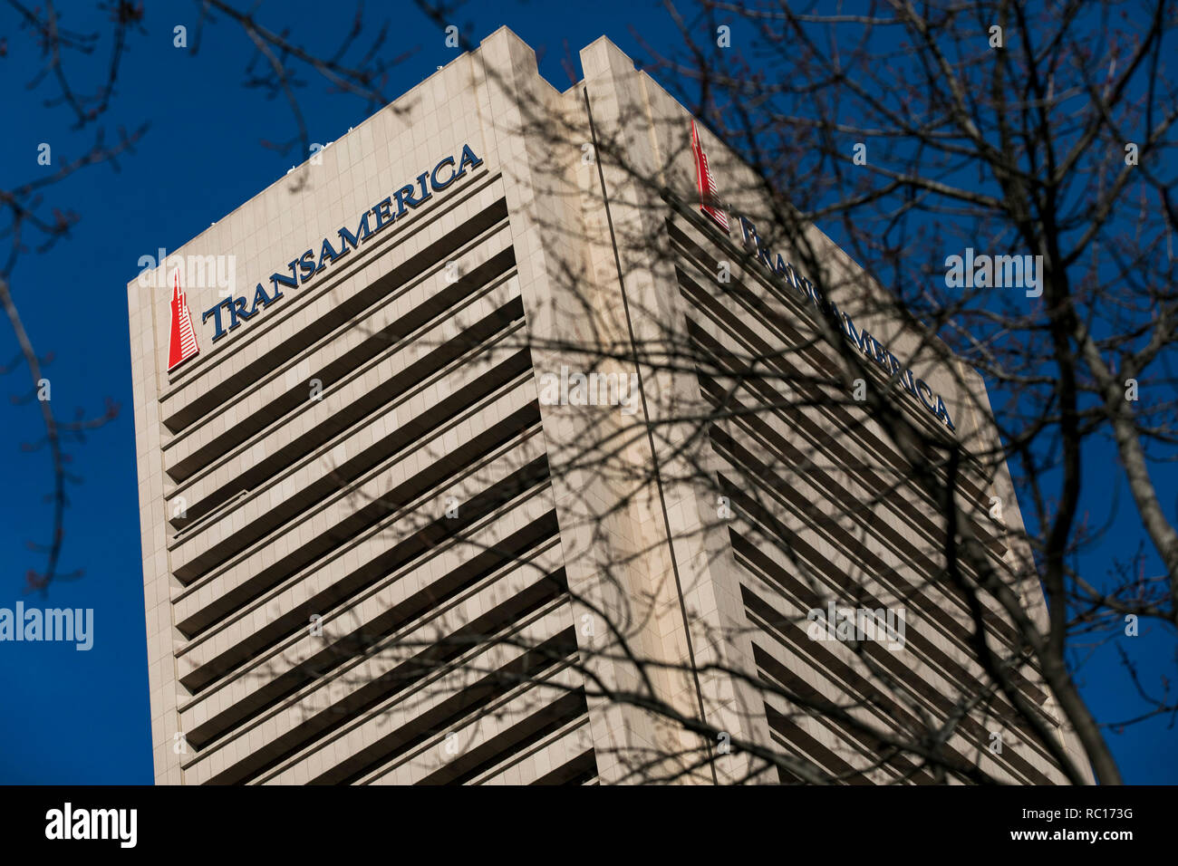 A logo sign outside of a facility occupied by The Transamerica ...
