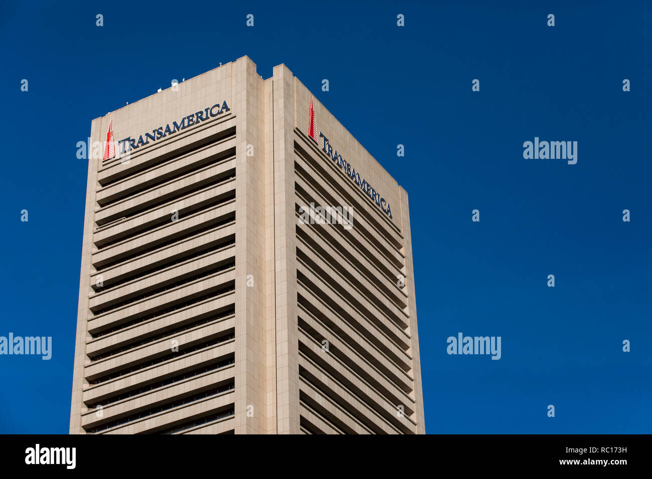 A logo sign outside of a facility occupied by The Transamerica ...