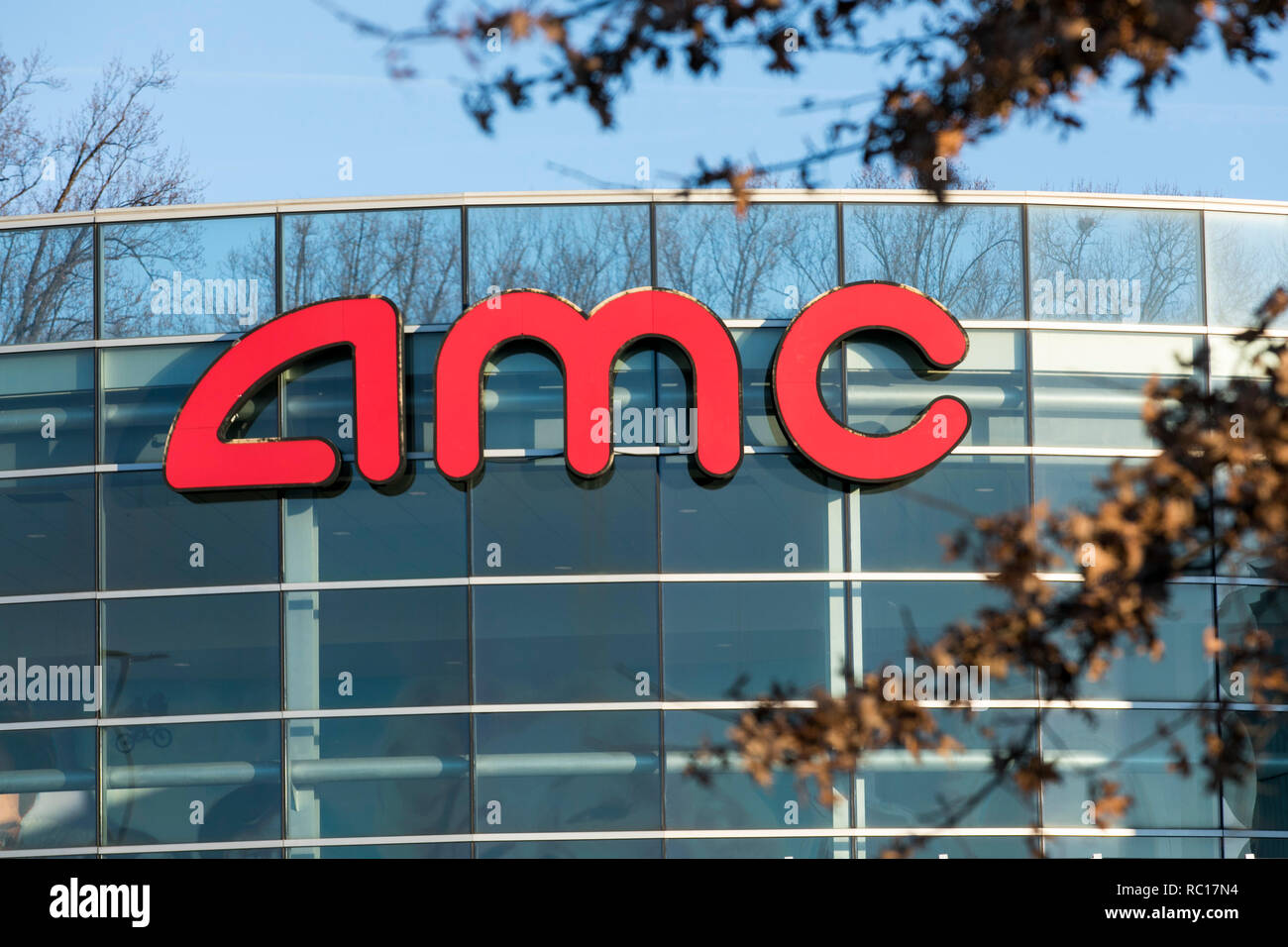 A logo sign outside of a AMC Theaters movie theater in Columbia ...