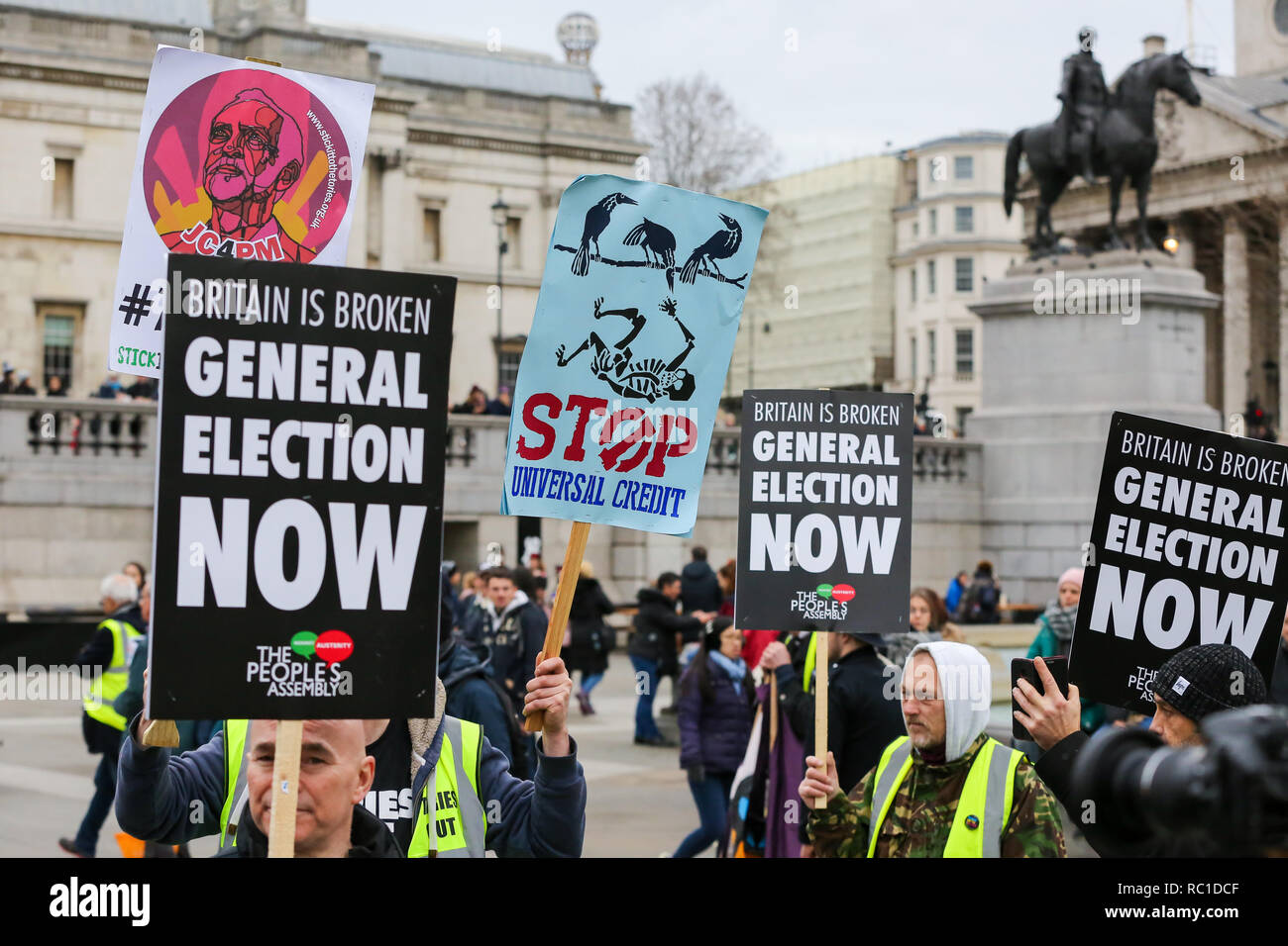 London, UK. 12th Jan, 2019. Protesters are seen holding placards during ...