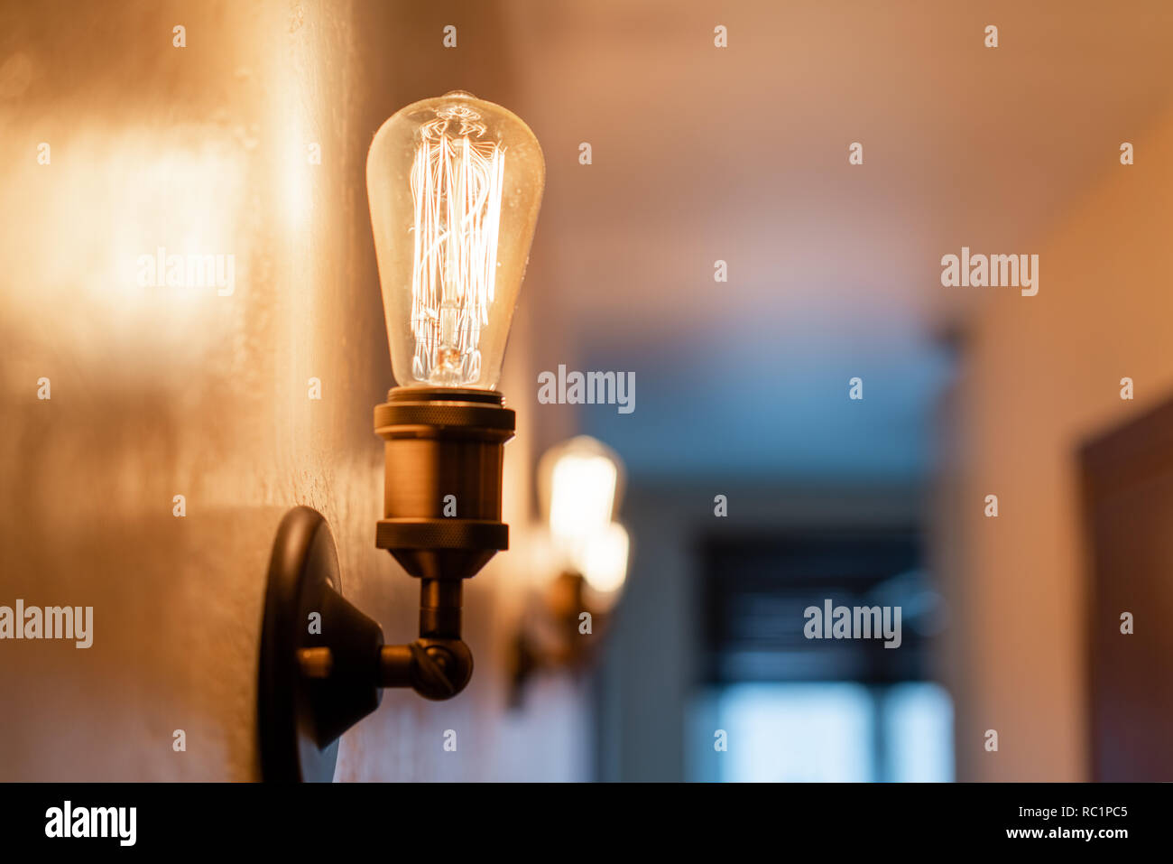 glass round bulbs with a spiral on wall Stock Photo - Alamy