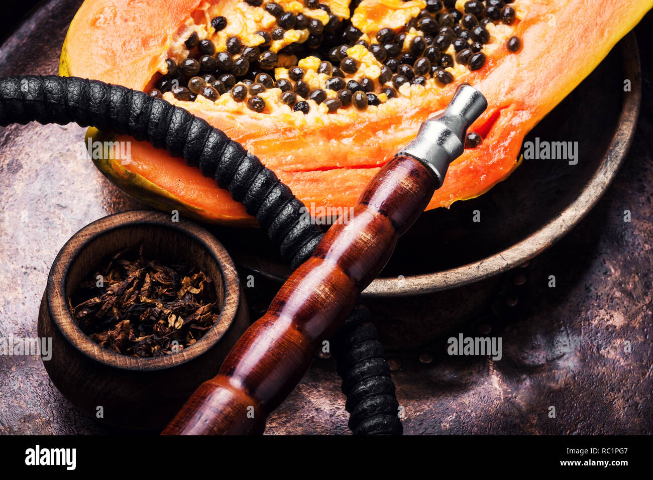 Fashionable fruit smoking hookah with a tobacco flavor of papaya ...