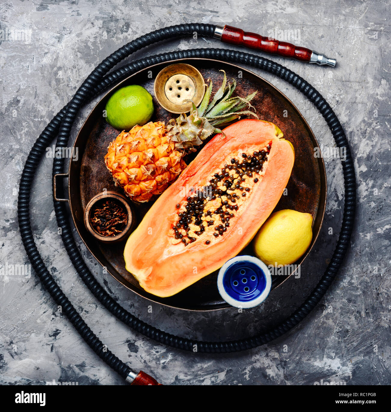 Oriental exotic hookah with papaya fruit flavor.Smoking Turkish shisha ...