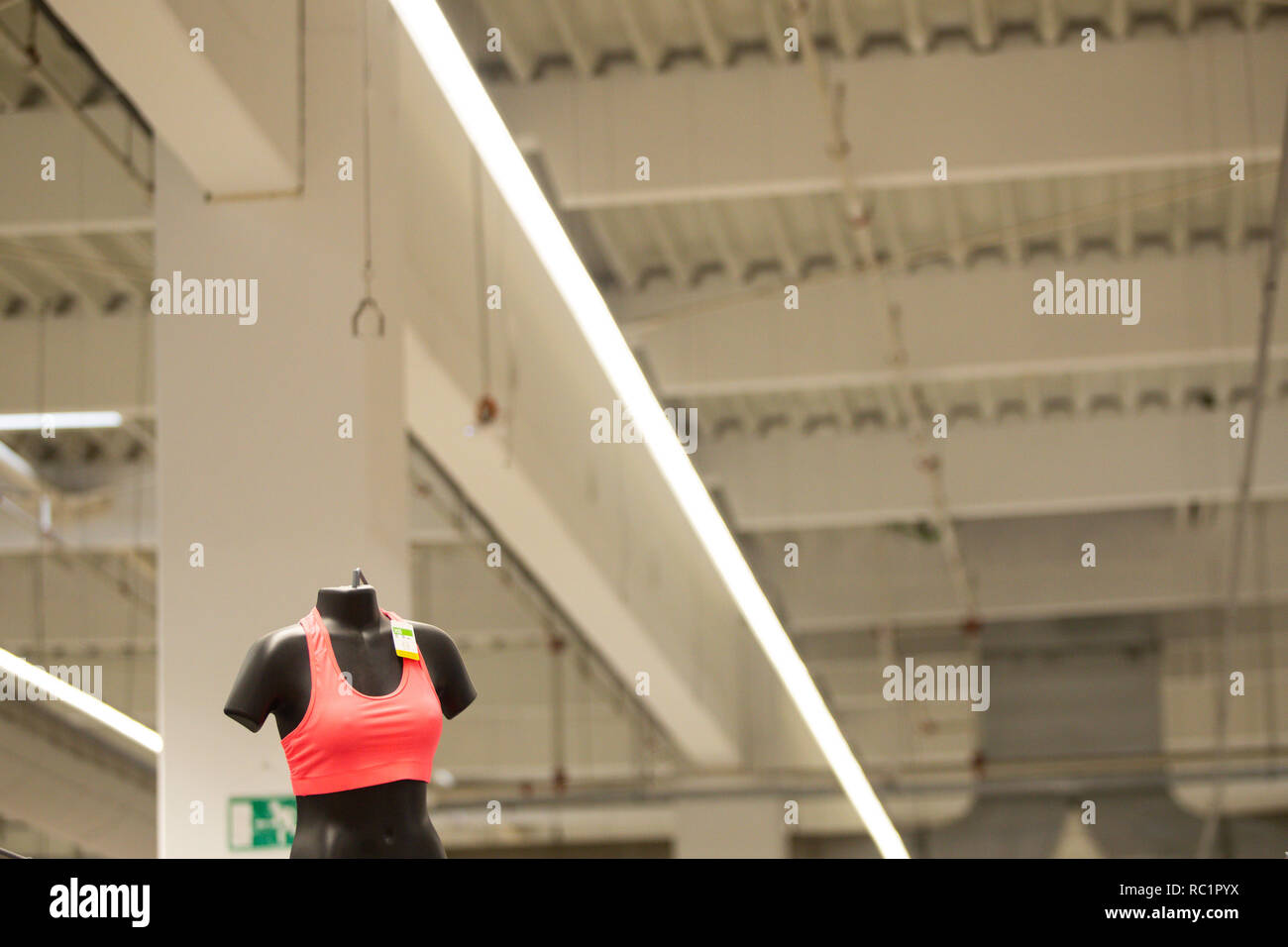 Armless and headless top part of a female fashion mannequin inside the ...