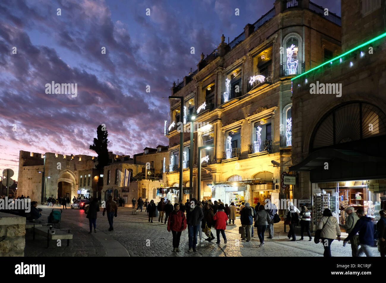 People walk through Omar Ibn Al-Khattab Square named for an important ...