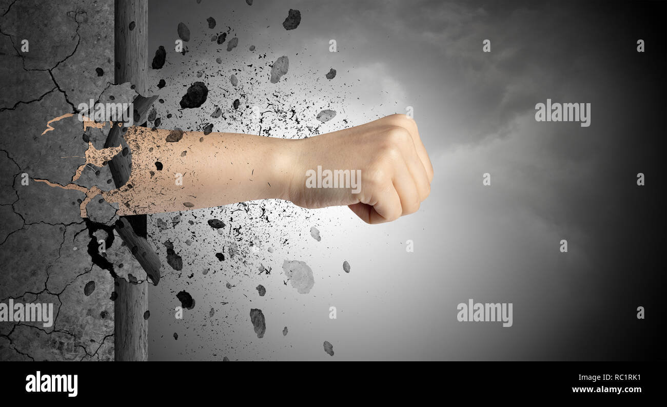 Big hand hits intense and breaks a crass stonewall Stock Photo - Alamy