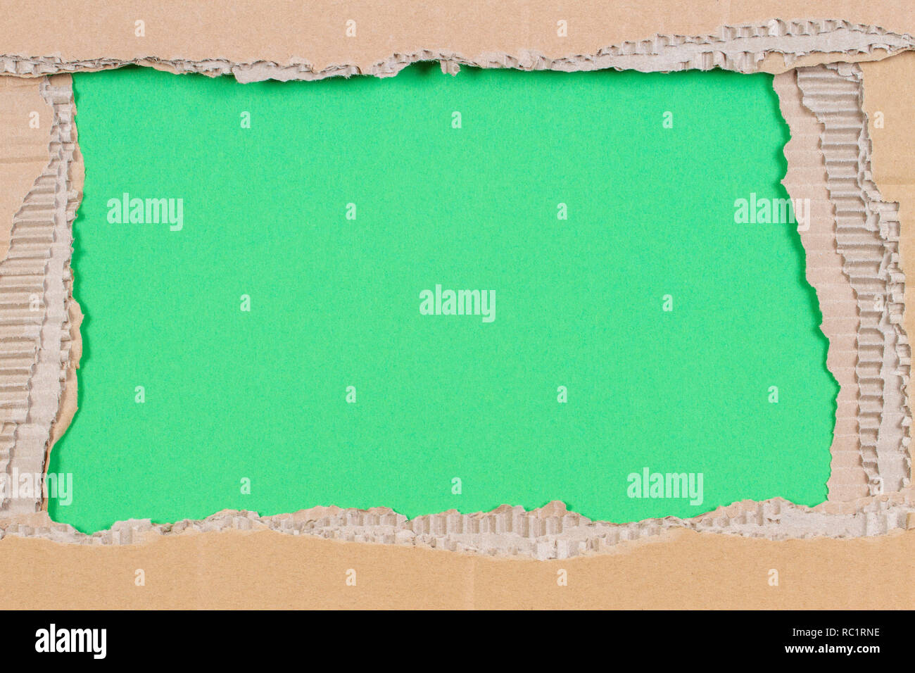 Brown corrugated cardboard ragged edge frame on yellow background Stock ...