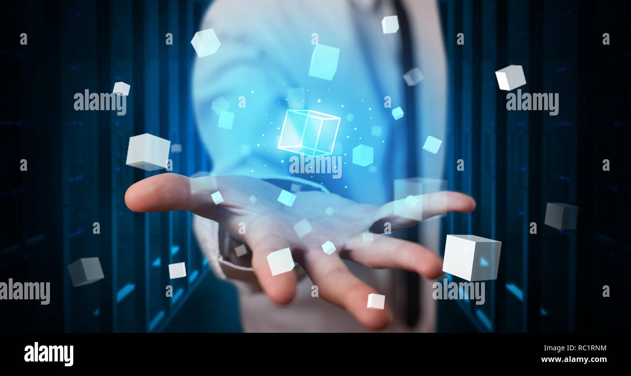 Person holding hologram projection displaying white cubes in server ...