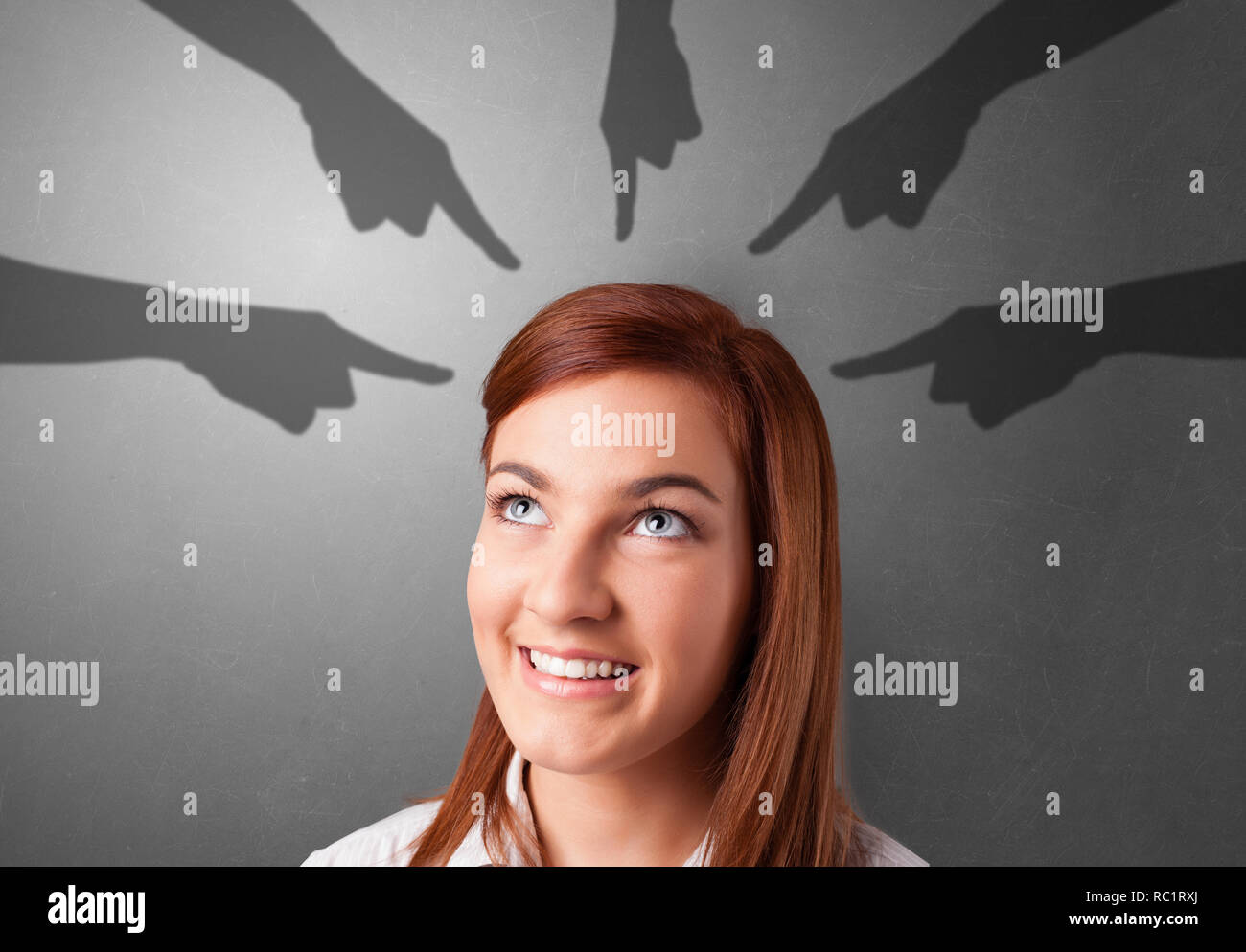 Young innocent student with pointing hands concept Stock Photo - Alamy