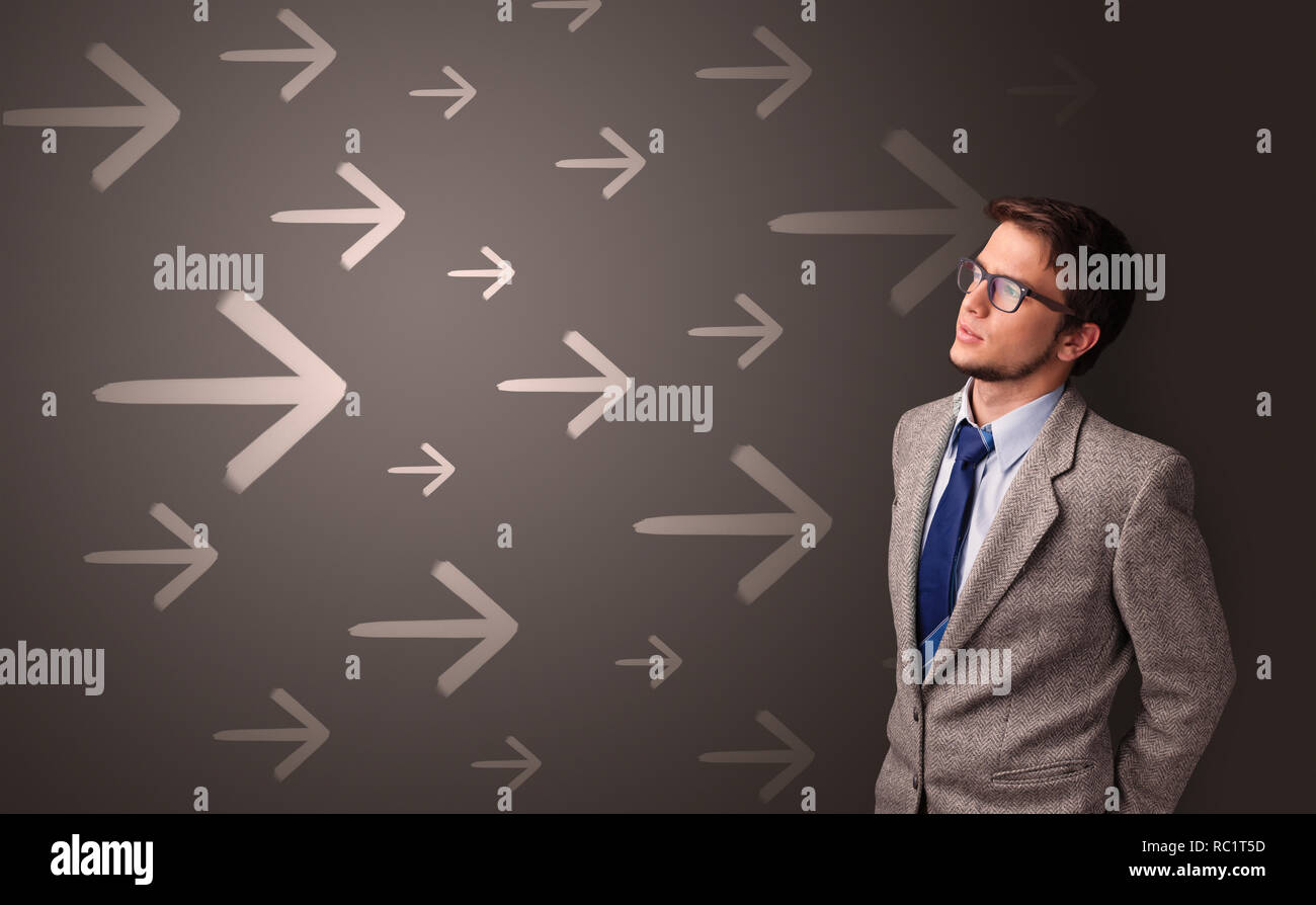 Young person thinking with direction concept background Stock Photo - Alamy