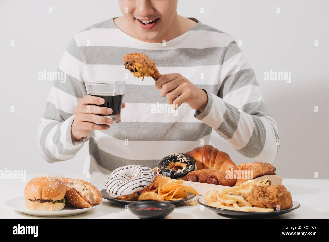People eating fast food concept hand holding deep fried chicken ...