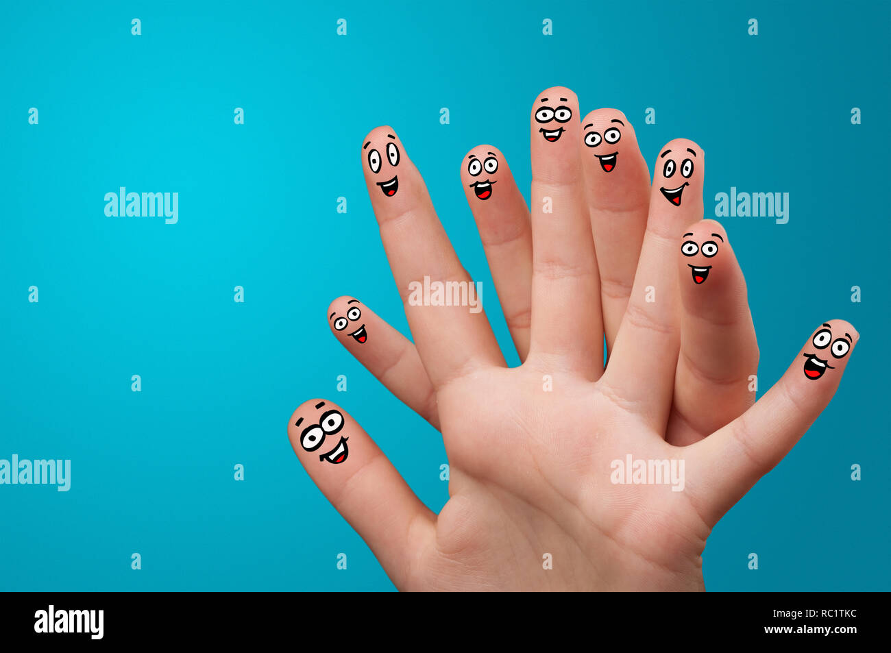 Happy face fingers hug each other Stock Photo - Alamy