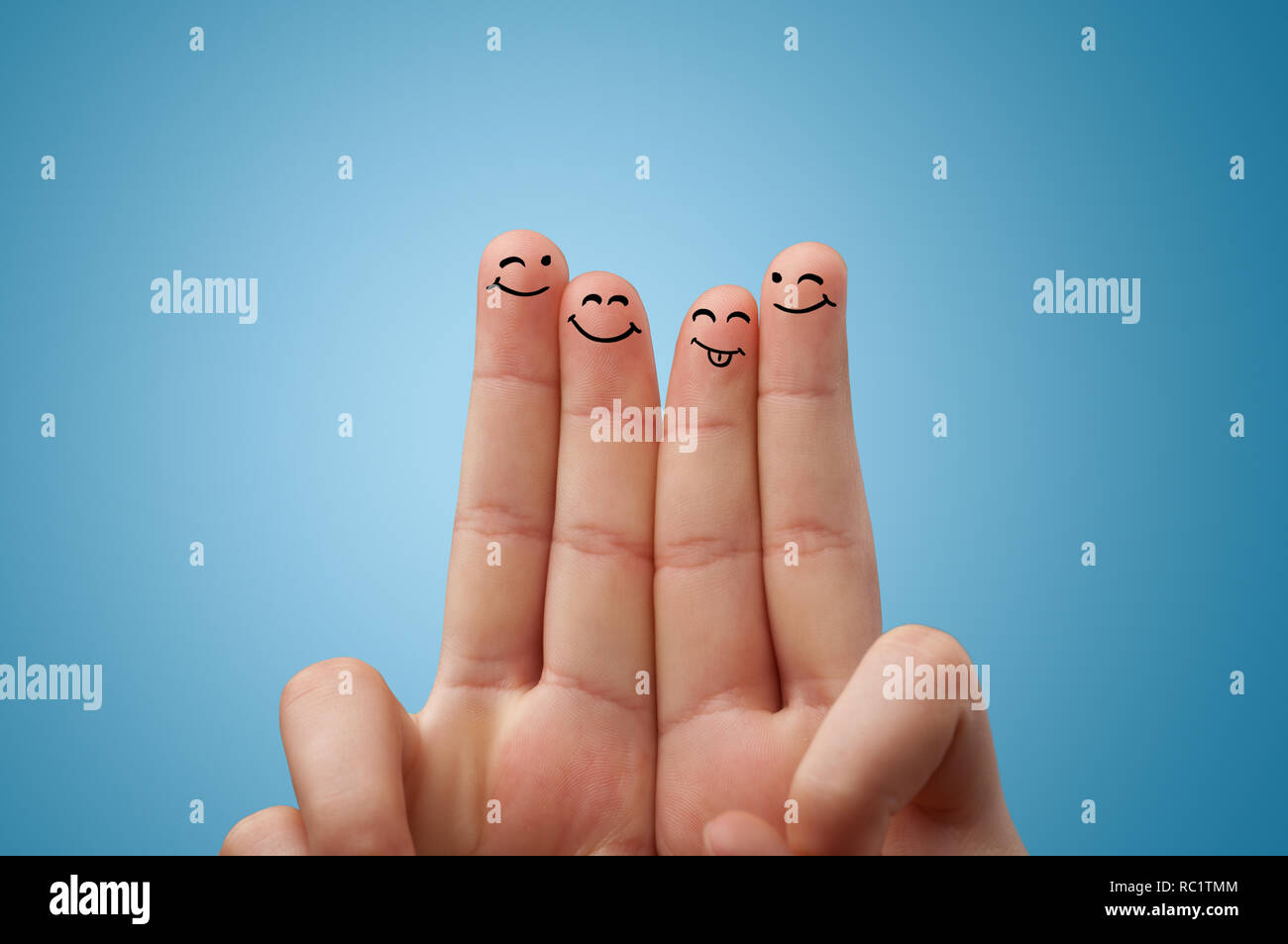 Happy face fingers hugs each other Stock Photo - Alamy