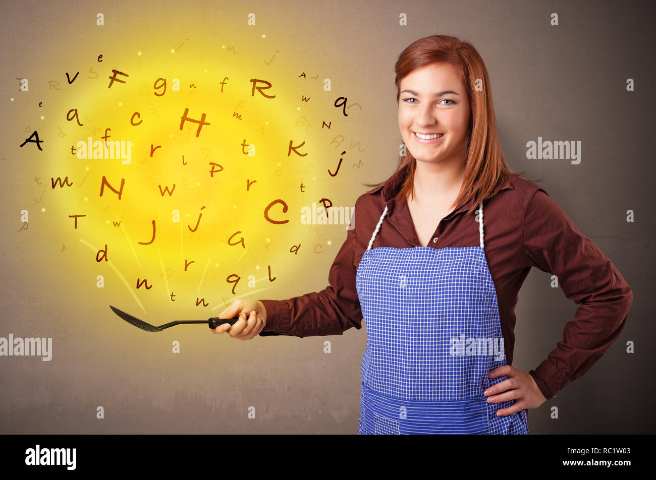 Young person cooking letters in wok Stock Photo - Alamy