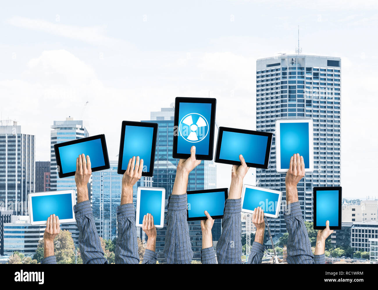 Close of man hands in line showing tablet pc with blank blue scr Stock ...