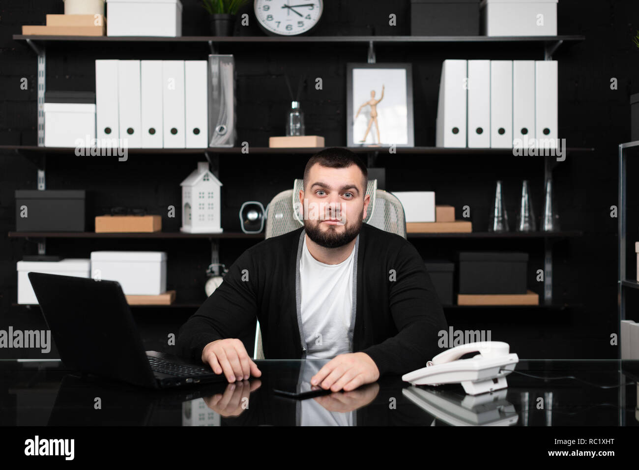 Portrait of man at computer Desk Stock Photo - Alamy