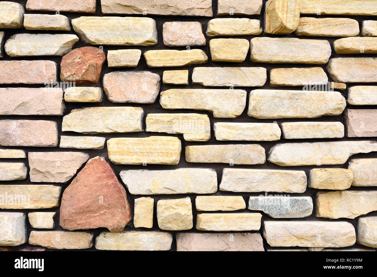 Ancient stone wall to use as background or texture Stock Photo - Alamy