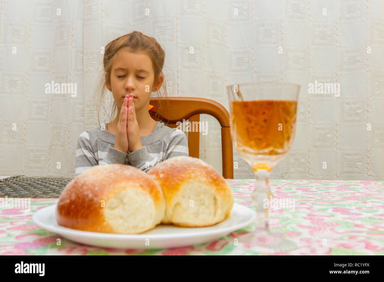 Child prays at Shabbat. Little Jewish Sabbath. Jewish child at the ...
