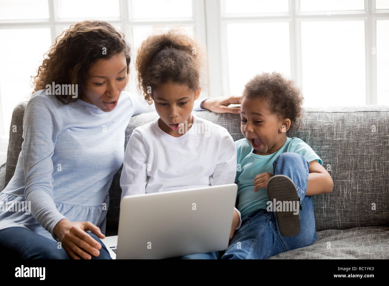 Boy using computer black children hi-res stock photography and images ...