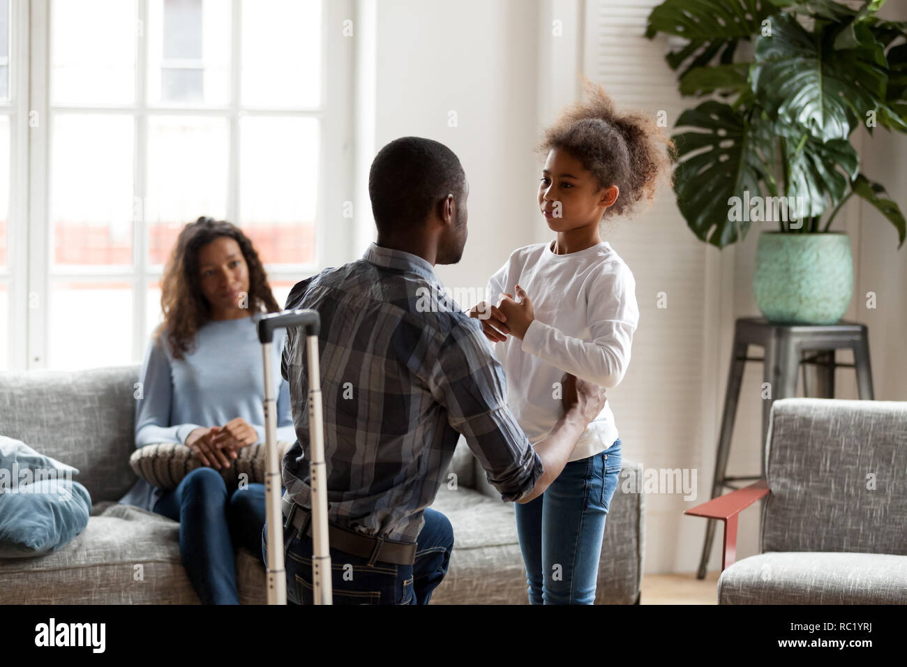 Father saying goodbye to family hi-res stock photography and images - Alamy