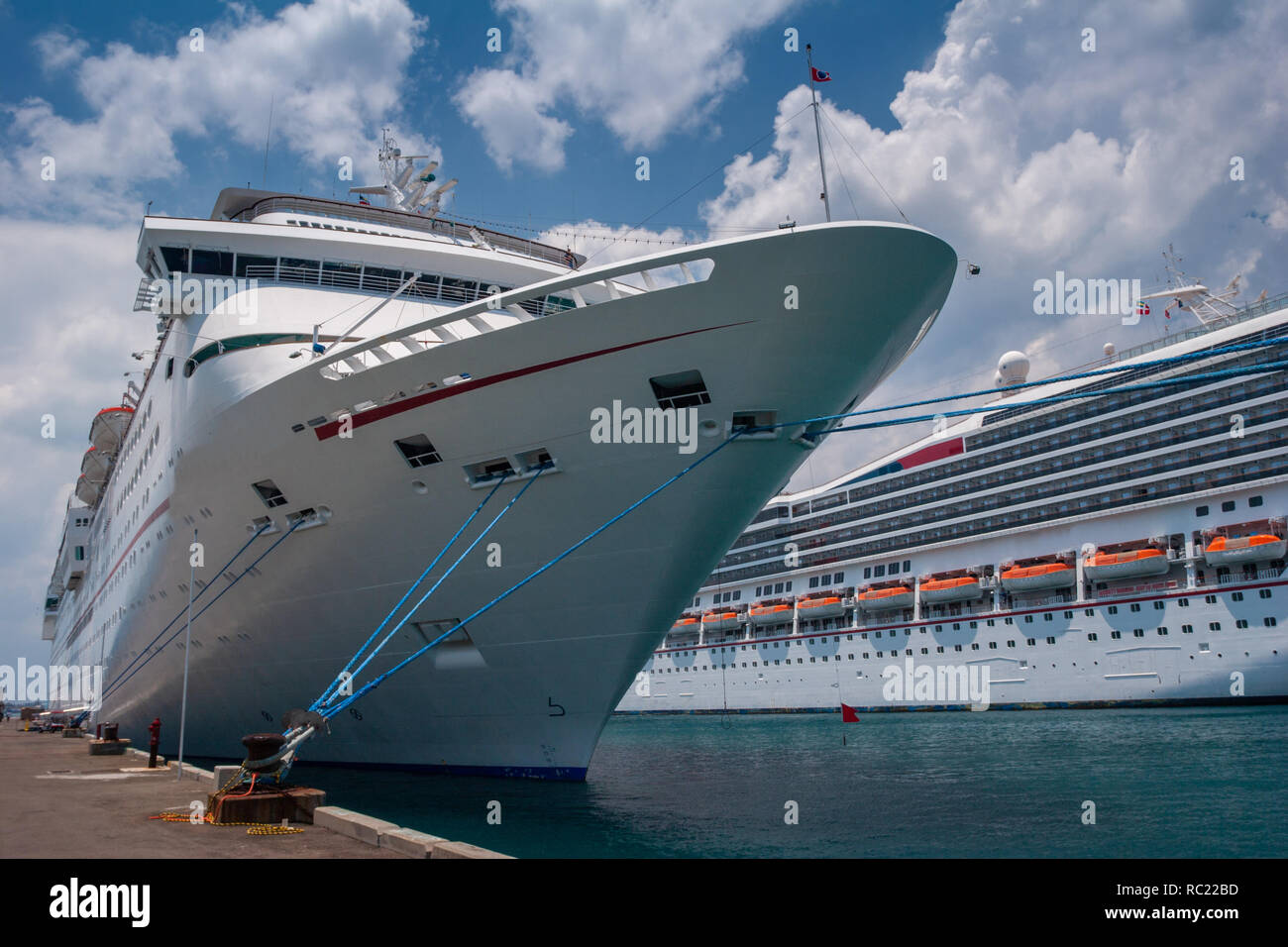 View on the massive cruise ship docked by the pier Stock Photo - Alamy