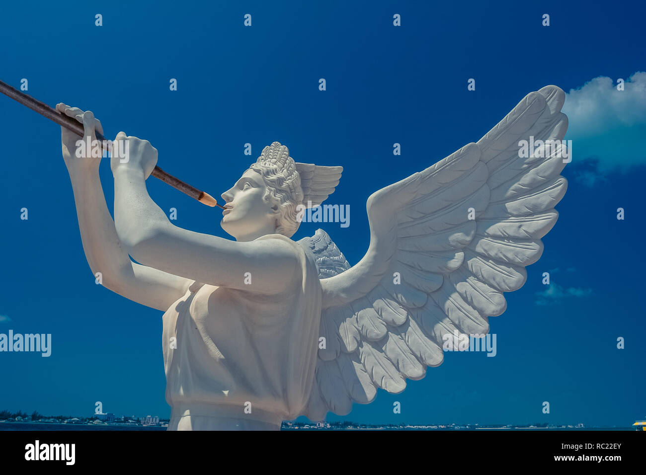 Angel holding trumpet hi-res stock photography and images - Alamy