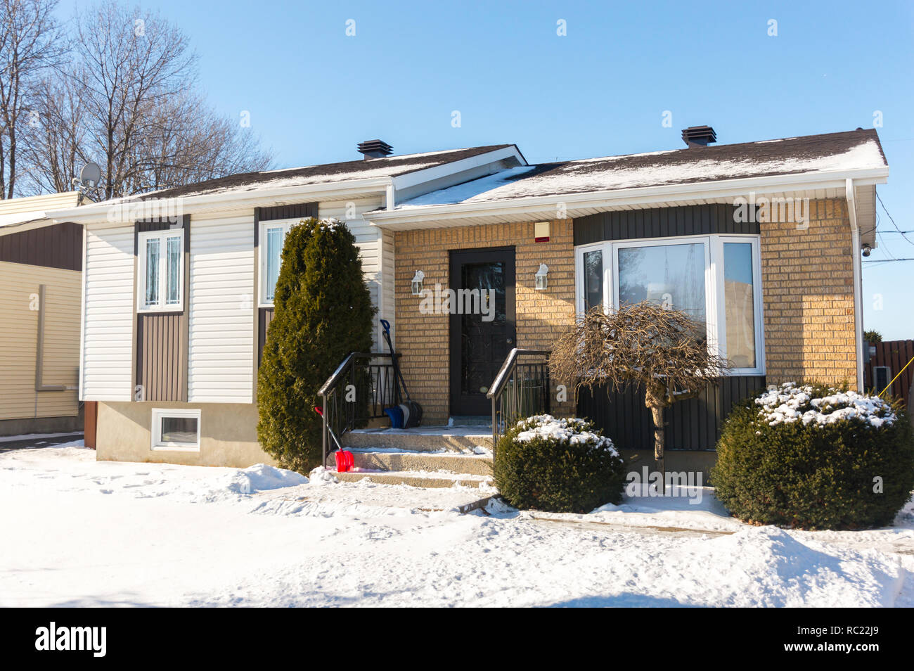 Typical Canadian House built in 1985 in snow, Montreal, Canada Stock ...