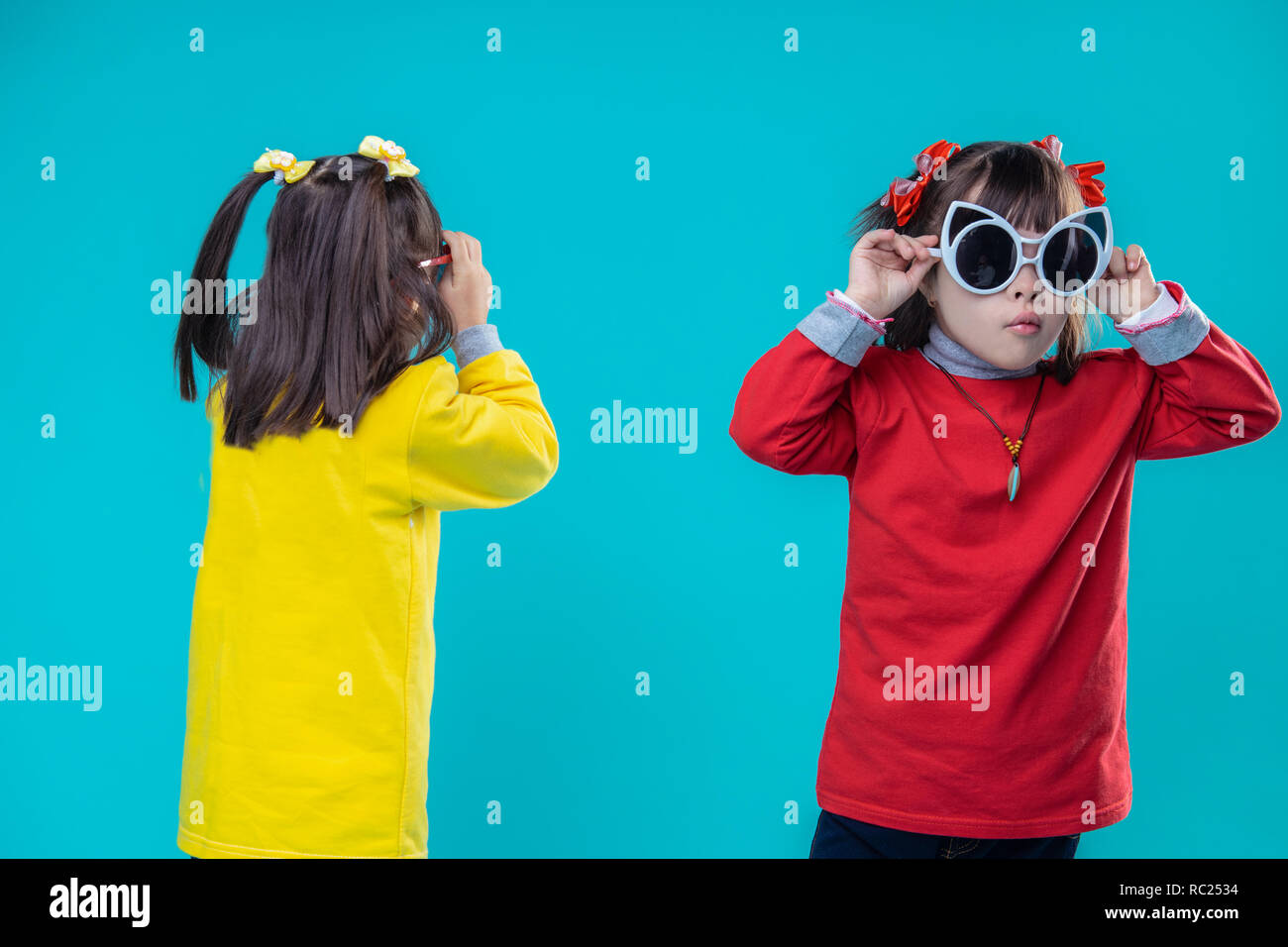 Interested Short Haired Girls With Mental Disorder Trying On Giant