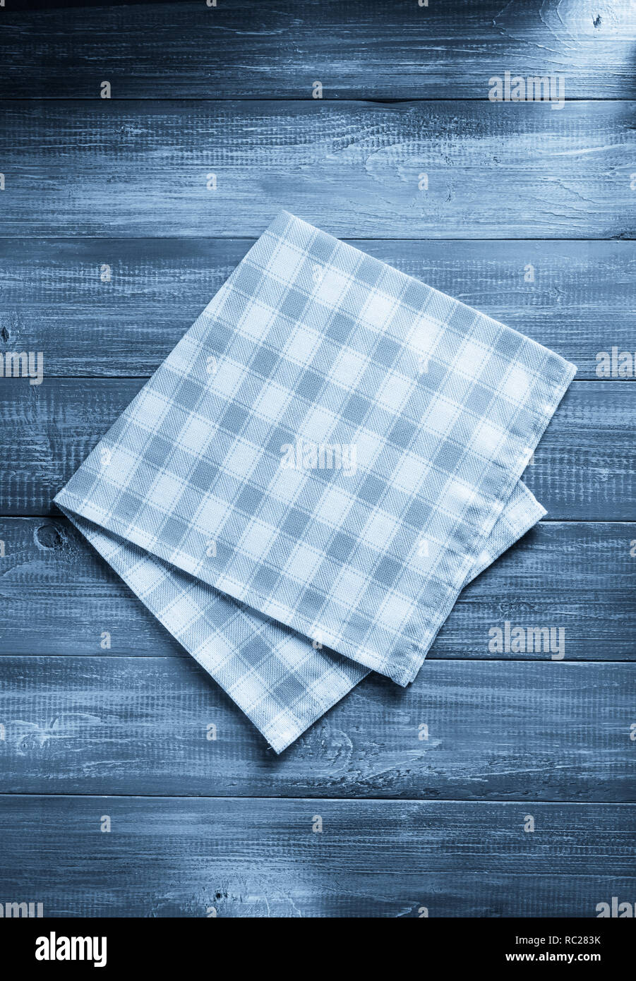 cloth napkin on wooden table background Stock Photo - Alamy