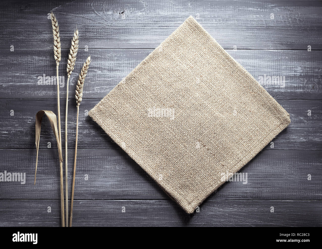 cloth napkin on wooden table background Stock Photo - Alamy