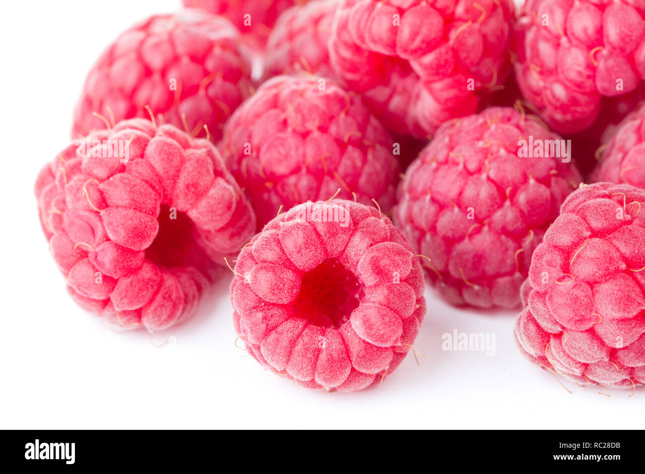 heap of ripe raspberry fruits isolated on white background Stock Photo ...