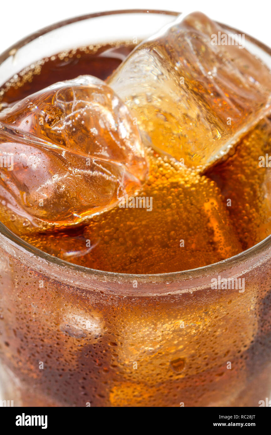 glass of cola with ice cubes on white background Stock Photo - Alamy