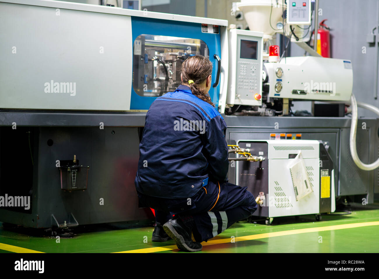 Maintaining machinery hi-res stock photography and images - Alamy