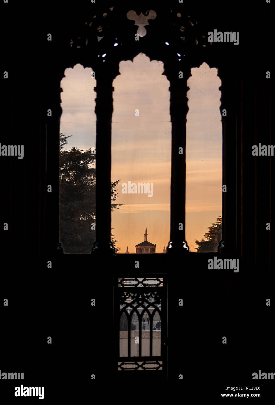 beautiful sunset viewed from a window of a gothic style building Stock ...