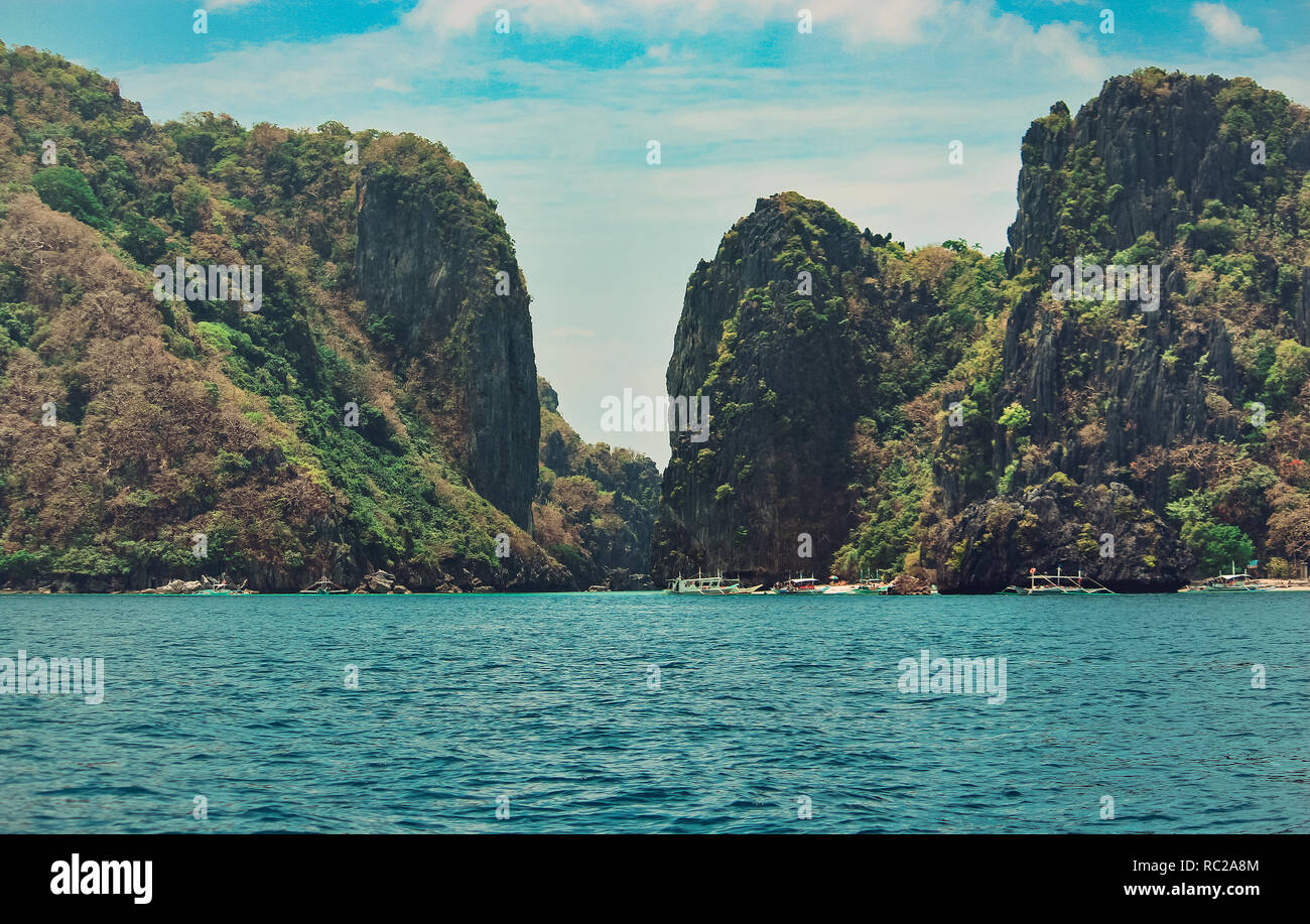 Tropical landscape with rock islands, crystal clear water, Palawan ...