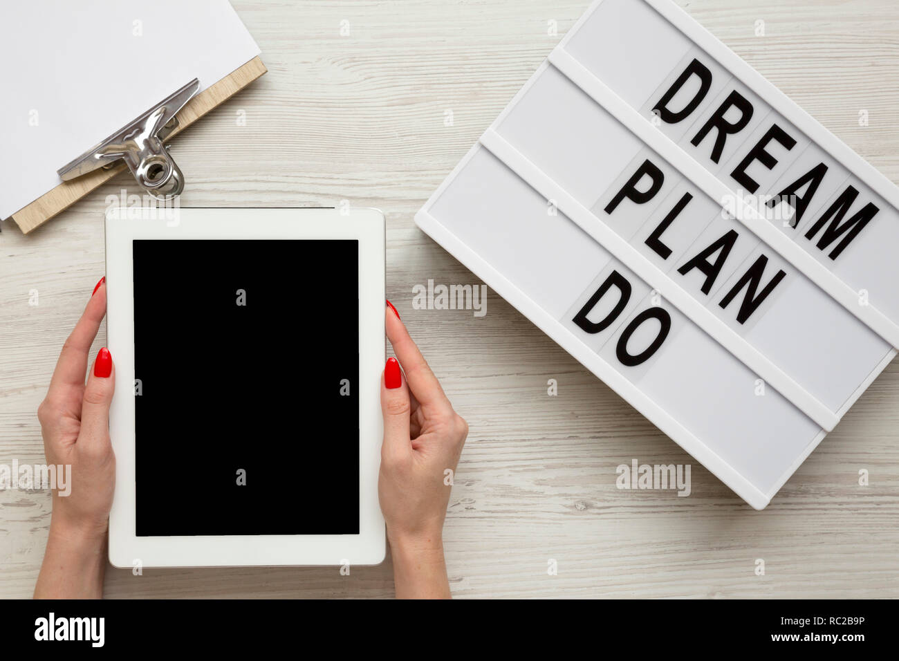 Hands hold tablet text dream hi-res stock photography and images - Alamy