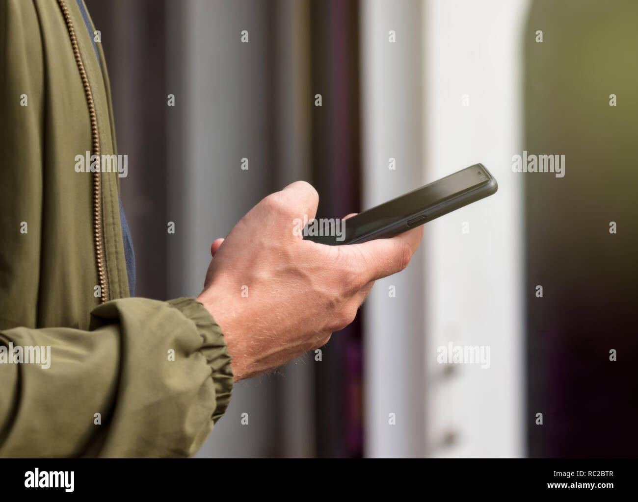 Person hand device hi-res stock photography and images - Alamy