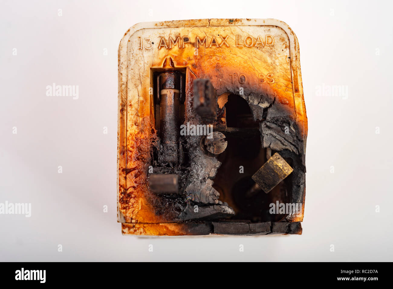 Fire damaged 3-pin plug Stock Photo - Alamy