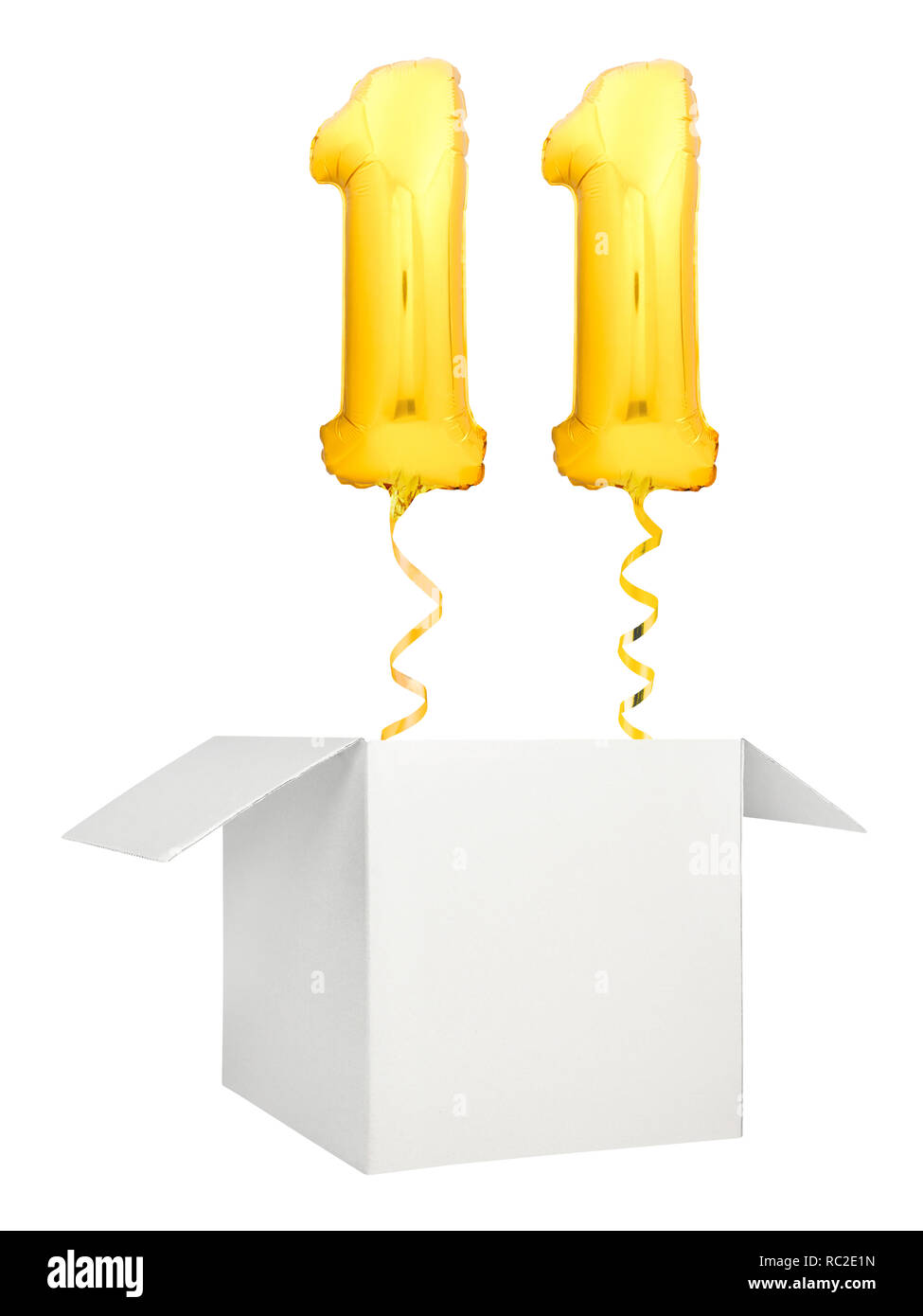Golden number eleven balloon flying out of blank white box isolated on ...