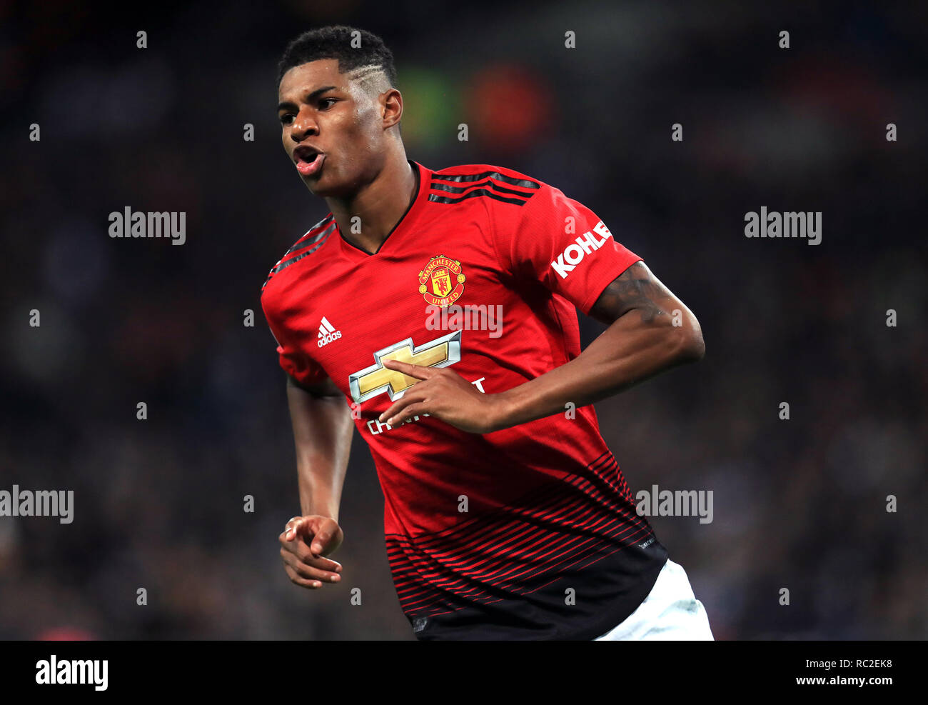 Manchester United's Marcus Rashford celebrates scoring his side's first ...