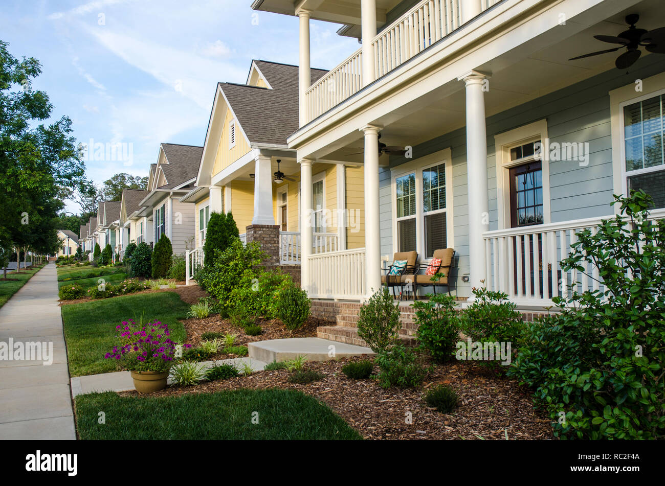 Row of Victorian-style Homes in a Suburban Neighborhood Stock Photo - Alamy