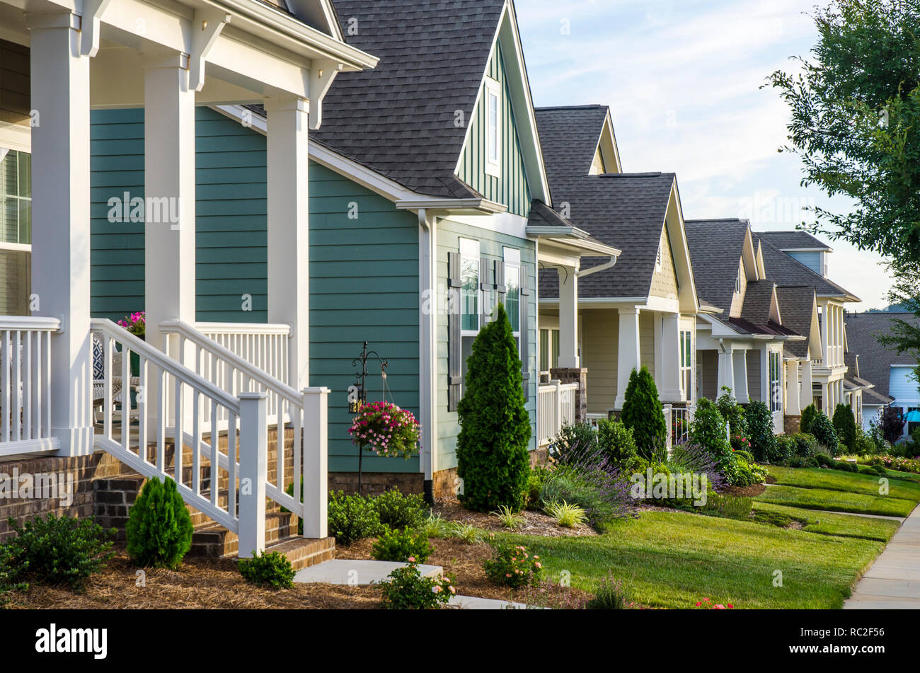 Row of Victorian-style Homes in a Suburban Neighborhood Stock Photo - Alamy