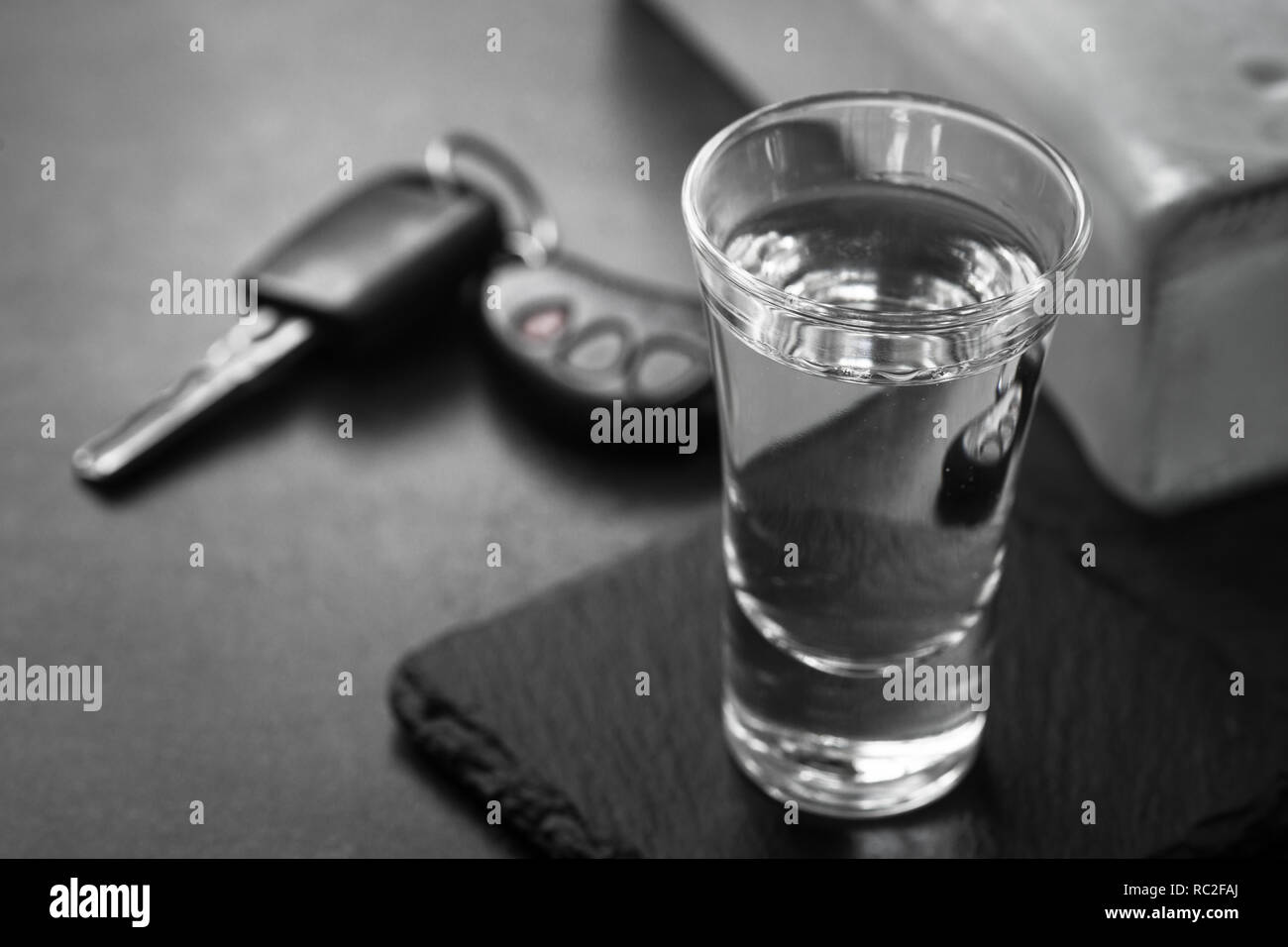 Vodka shot drink and car key Stock Photo - Alamy