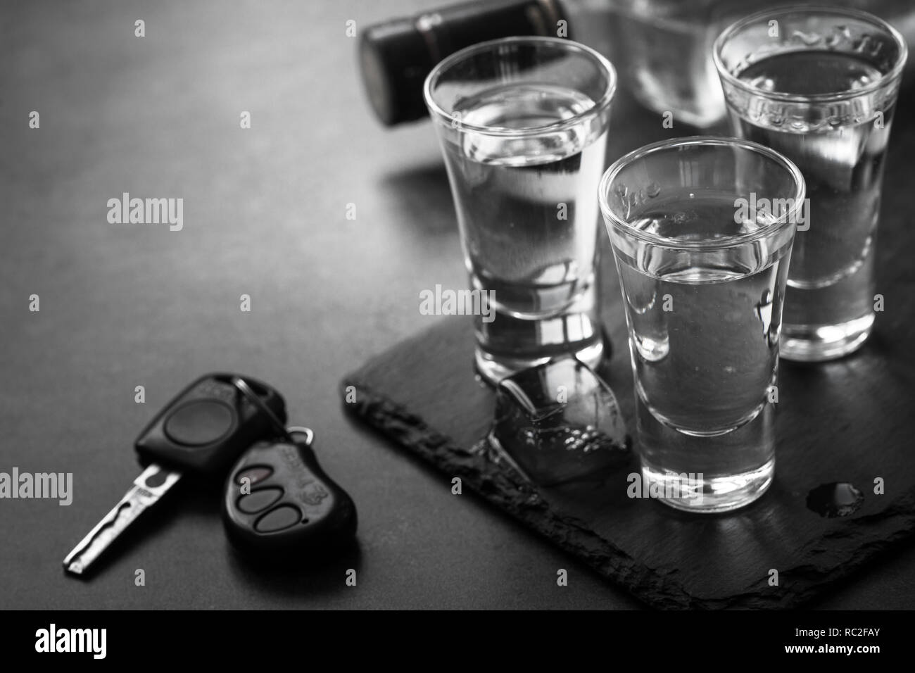 Vodka shot drink and car key Stock Photo - Alamy