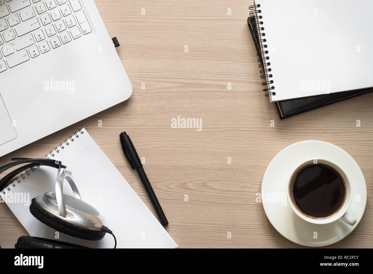 Laptop, coffee and croissant at desk table Stock Photo - Alamy