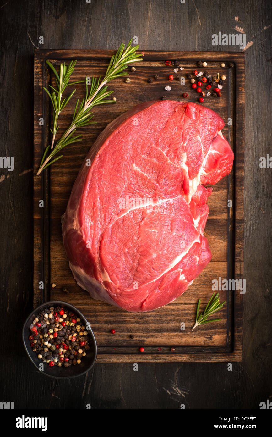 A large piece of beef chop on a cutting board Stock Photo - Alamy