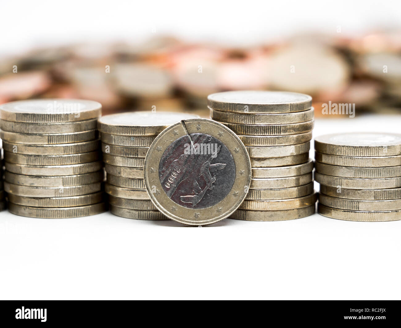 Image of pile of Euro coins with cent coins in the background close up ...